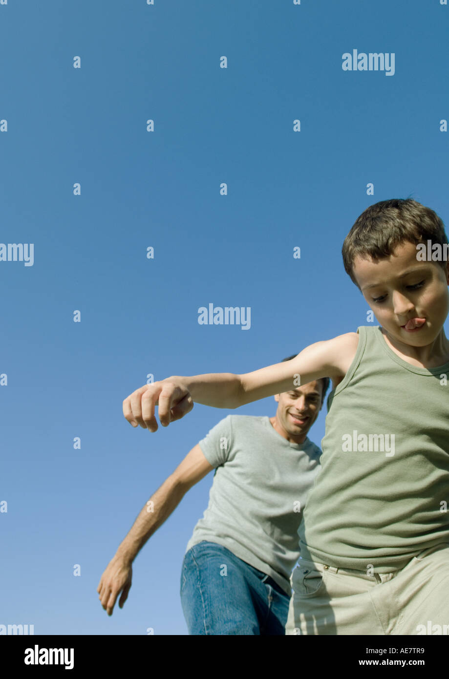 Kids following parents hi-res stock photography and images - Alamy