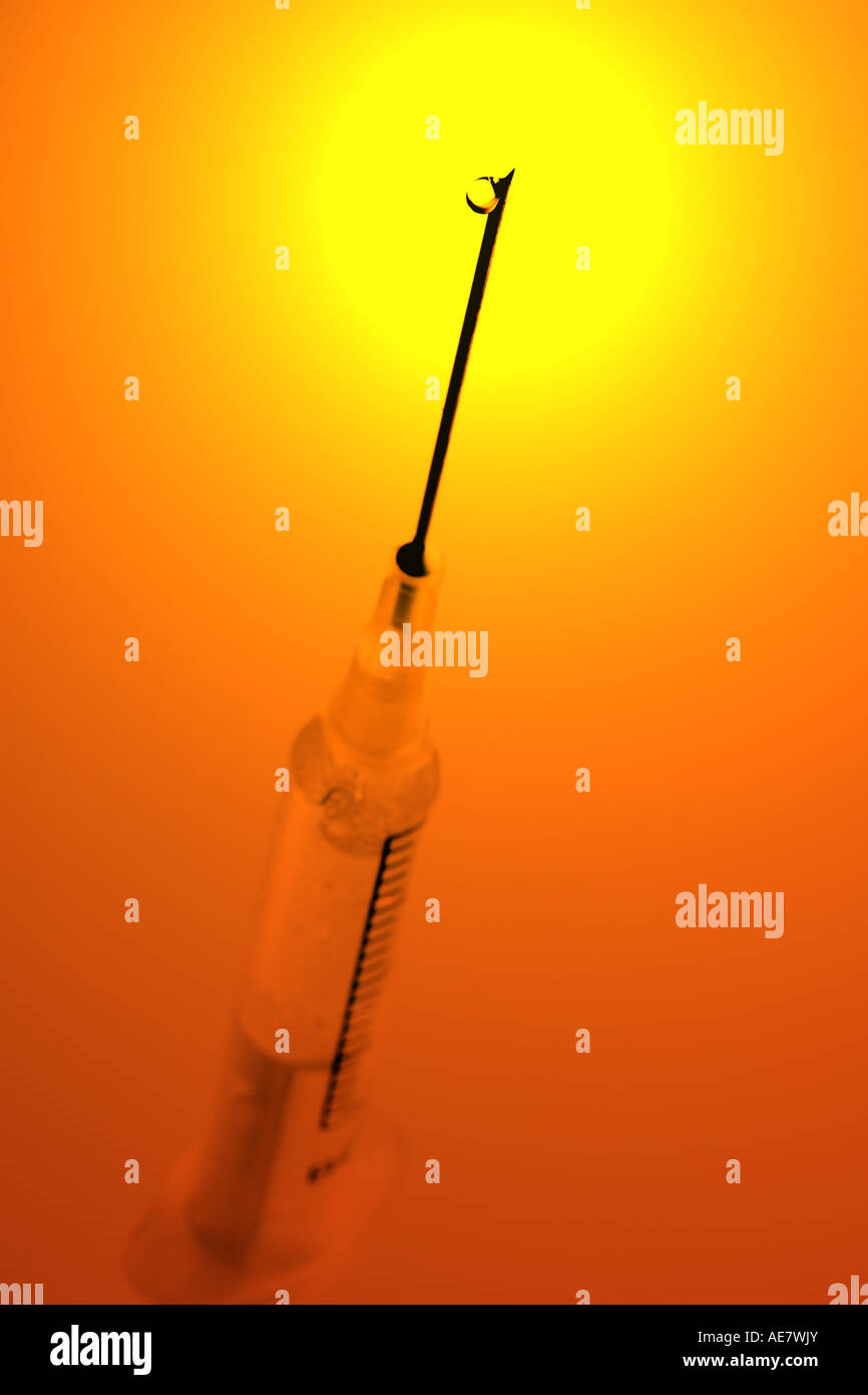 injection with drops on the needle Stock Photo - Alamy