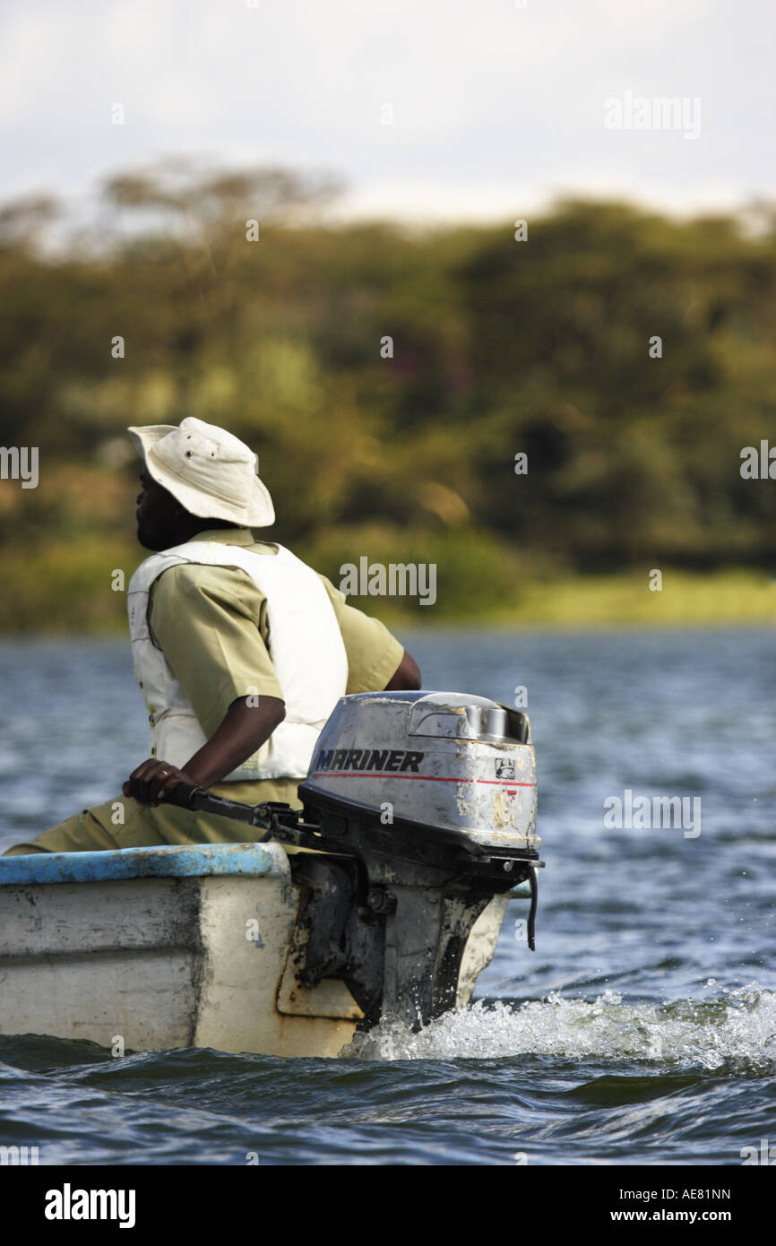 Man in motor boat Stock Photo - Alamy