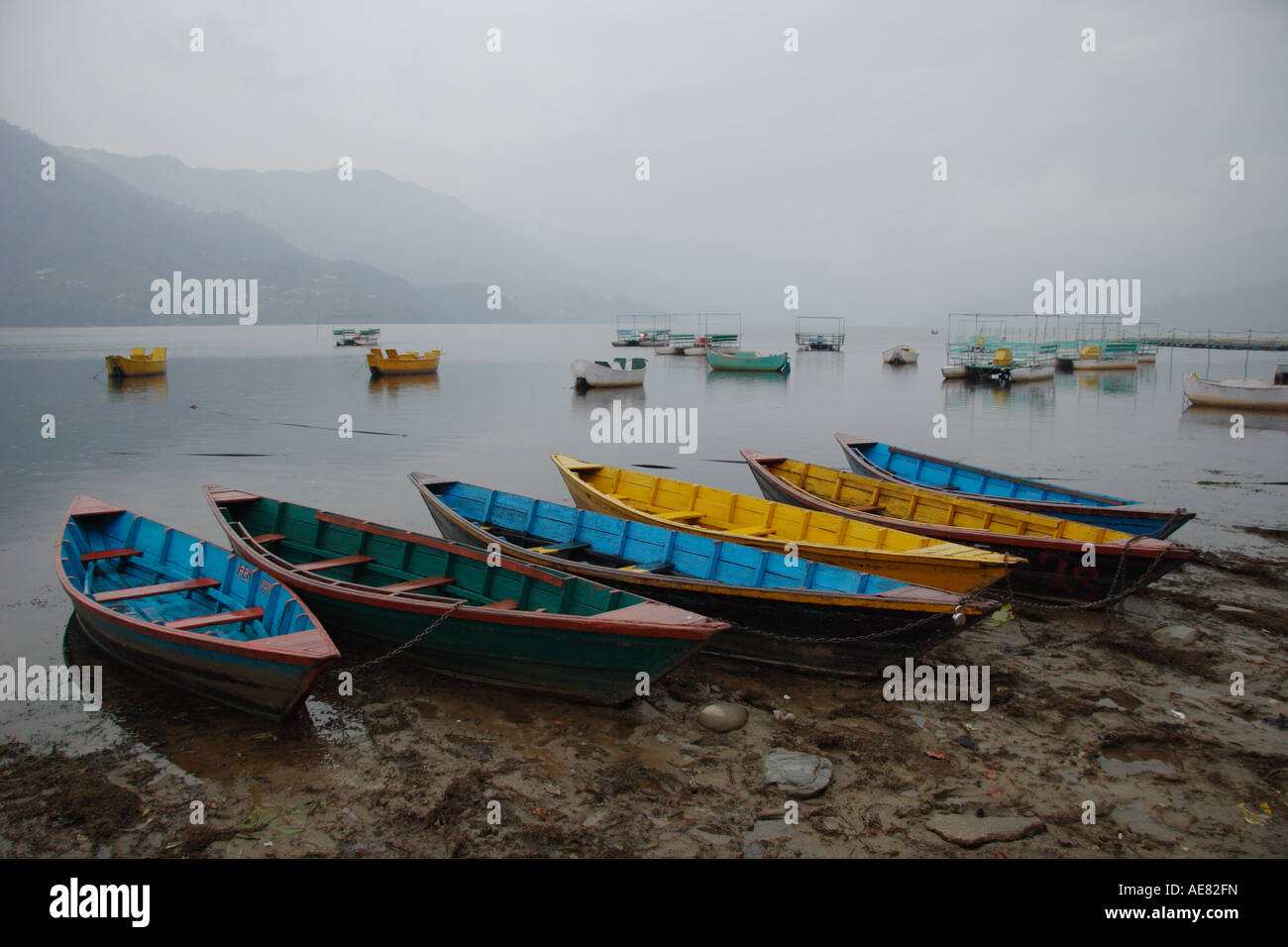 Empty fishing boats at Phewa Lake, Nepal Stock Photo - Alamy