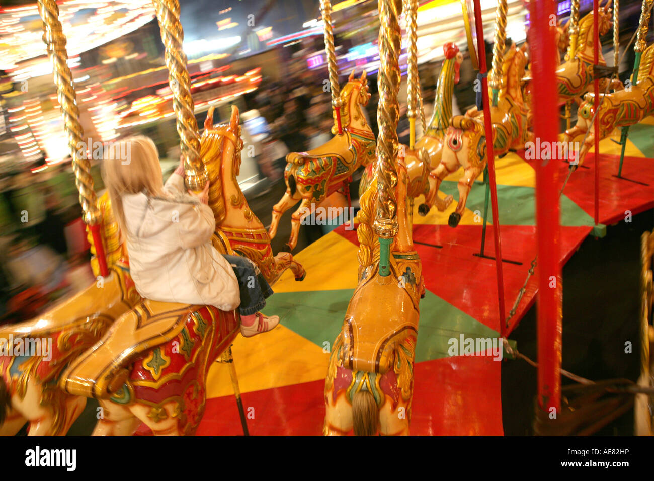 Child on Carousel at Goose Fair, Nottingham Stock Photo - Alamy