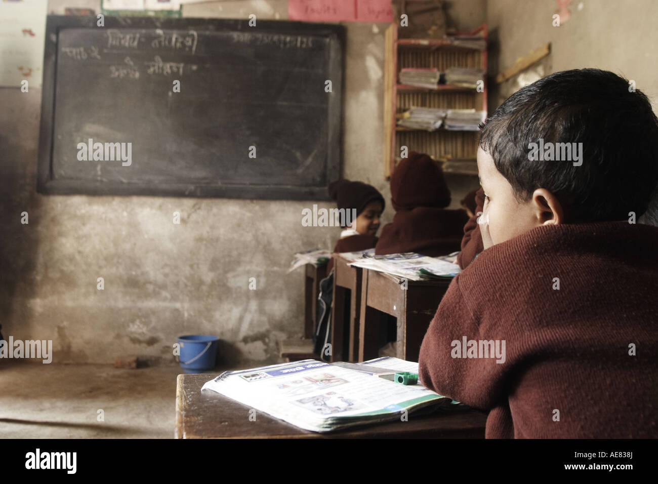 Small school boy sitting in his class room, Nepal February 2007 Stock ...