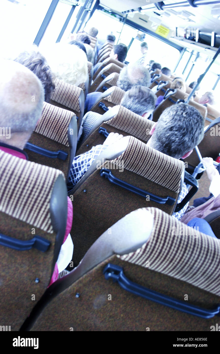 Rear view of passengers sitting in bus Stock Photo - Alamy