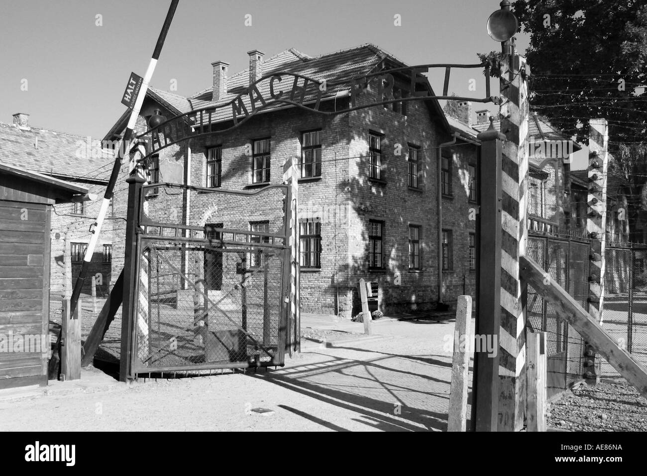 The entrance gate to Auschwitz-Birkenau with its Arbeit Macht Frei ...