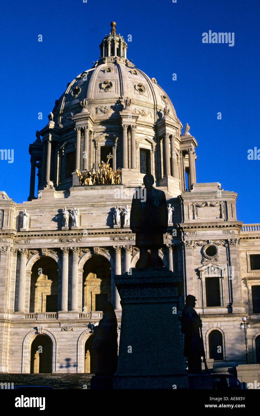 ONE OF MANY STATUES WHICH SURROUND THE MINNESOTA STATE CAPITOL IN ST ...