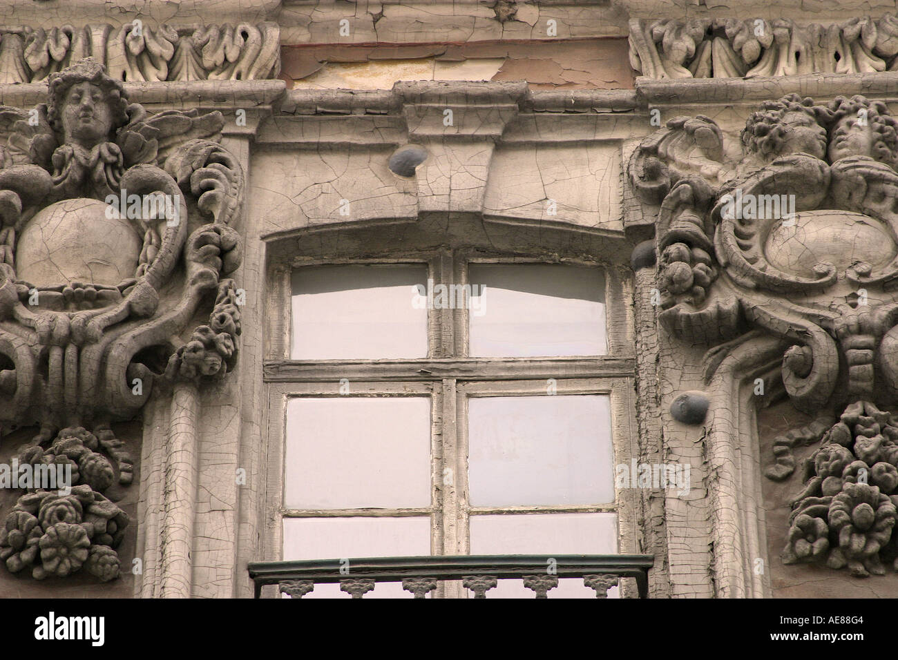 Typically ornate stonework around an upper building window in Lille ...