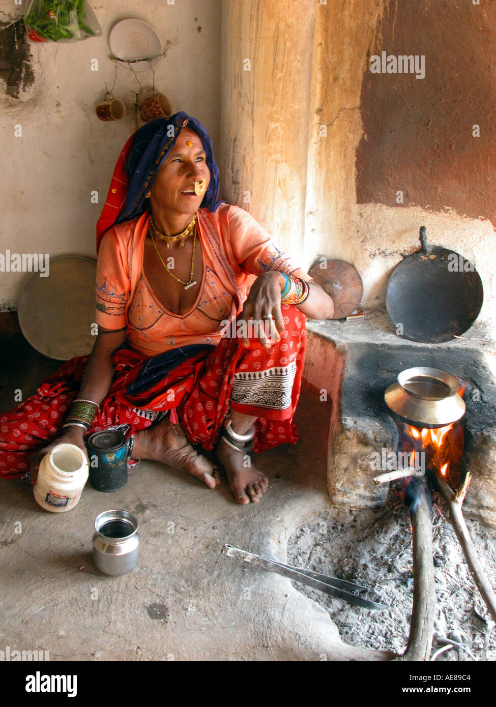 Bishnoi woman making tea India Rajasthan Stock Photo - Alamy