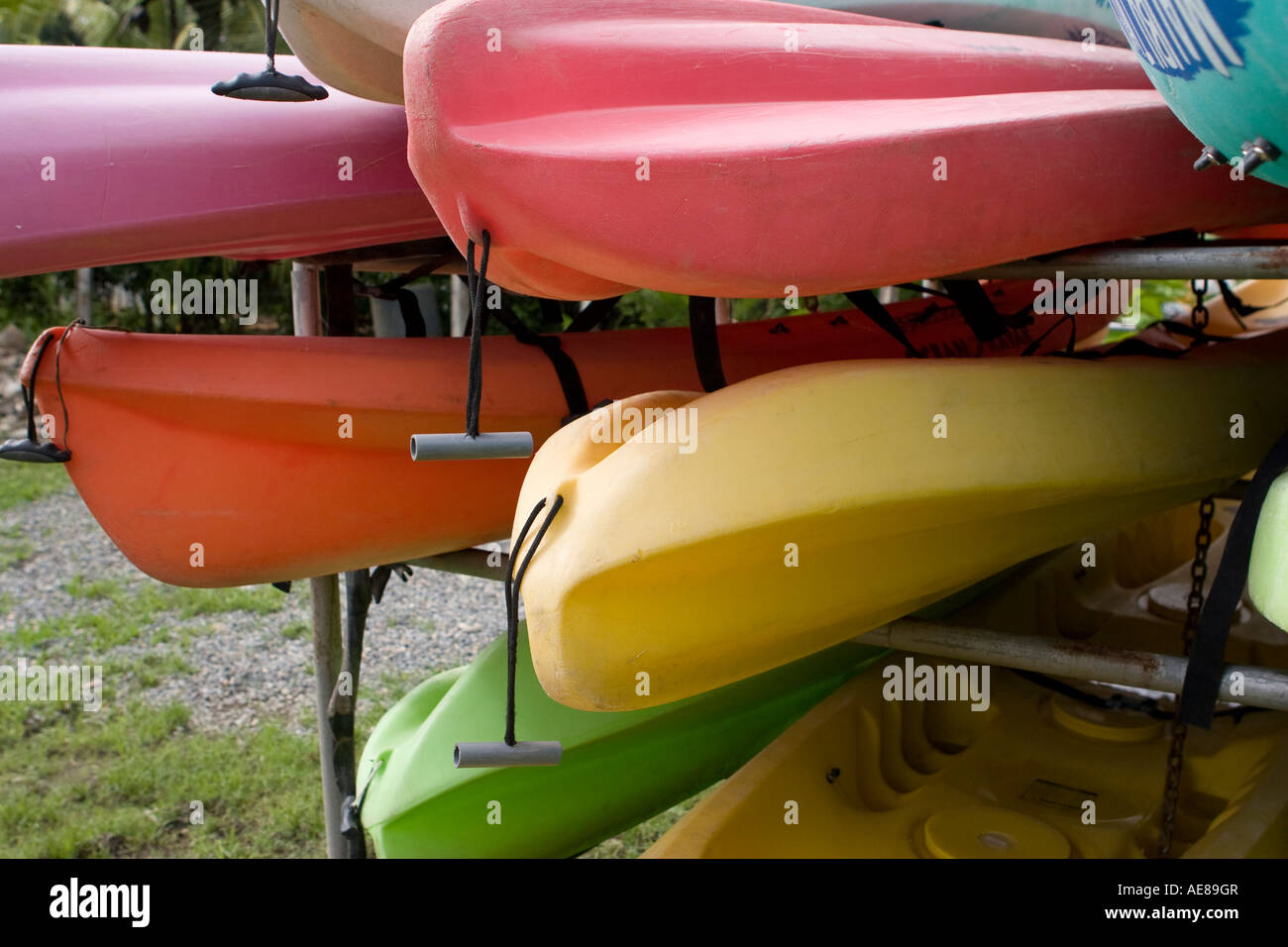 boat boats color colorful kayak pink red yellow Stock Photo - Alamy