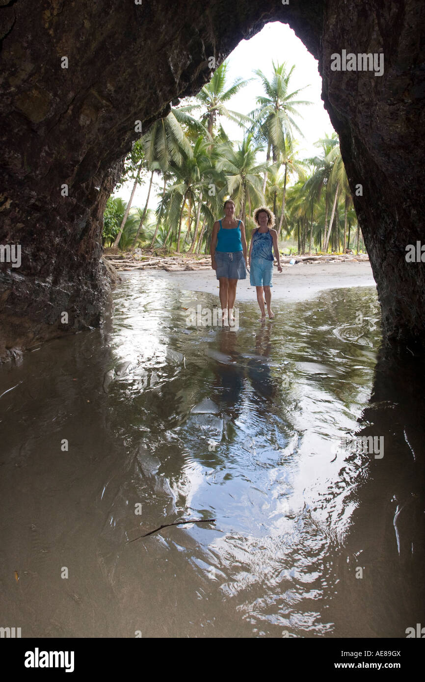 cave female girl palm tree woman Stock Photo - Alamy