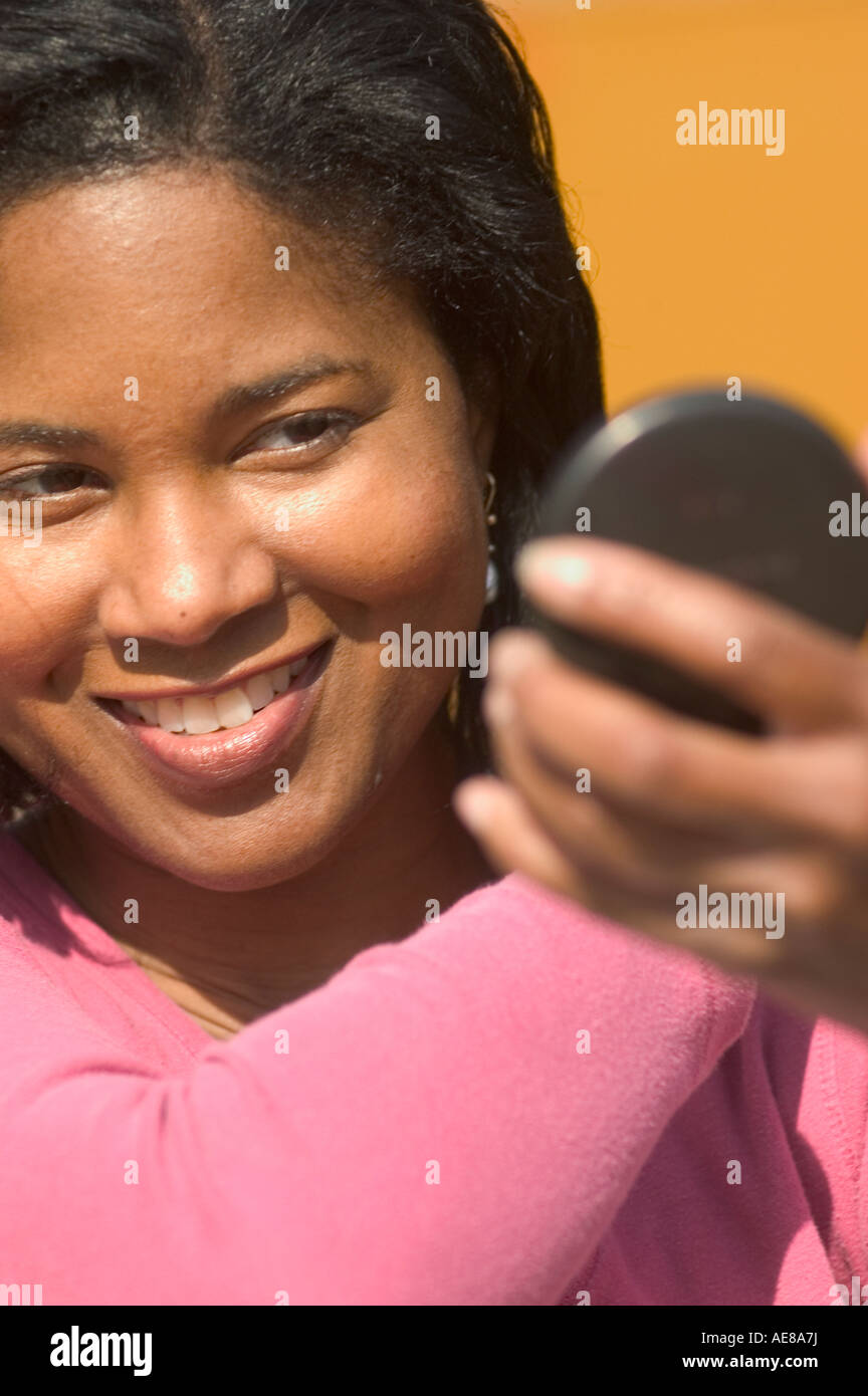 Preening woman hi-res stock photography and images - Alamy