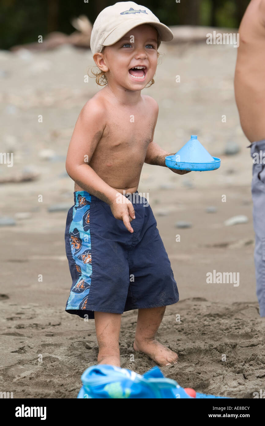 boy playing in the sand Stock Photo - Alamy