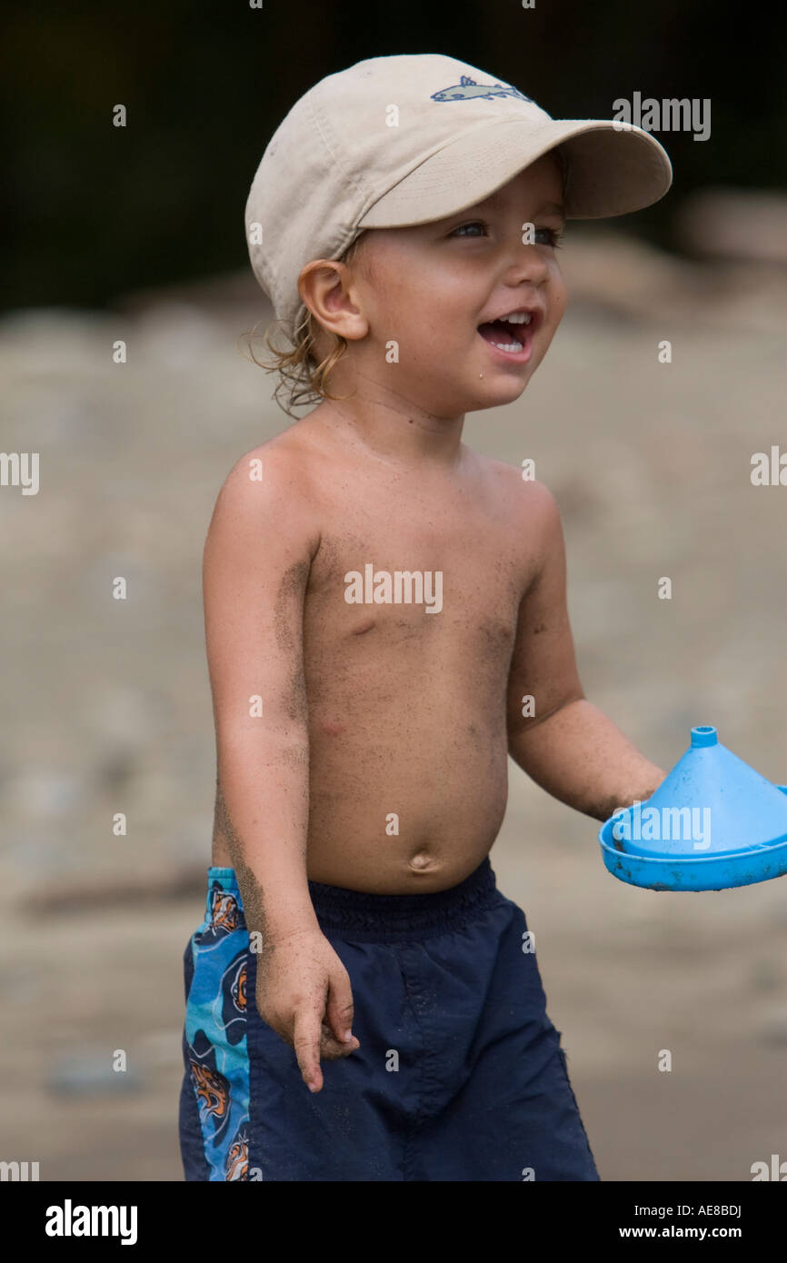 boy playing in the sand Stock Photo - Alamy