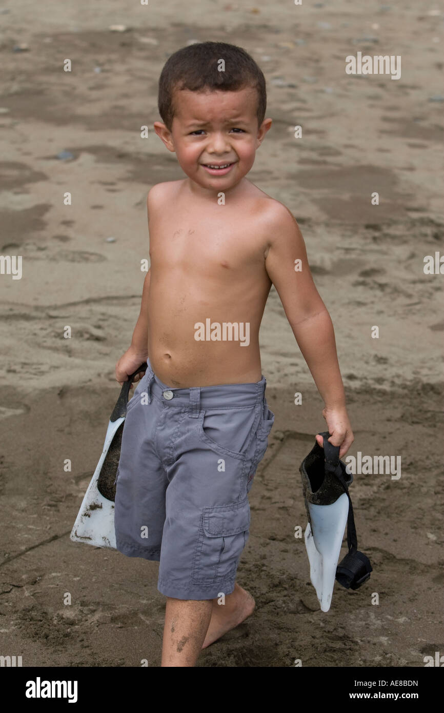 boy walking with fins Stock Photo - Alamy