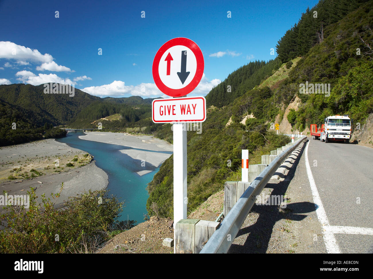 Motu river gorge and bridge east cape with give way sign on narrow road ...
