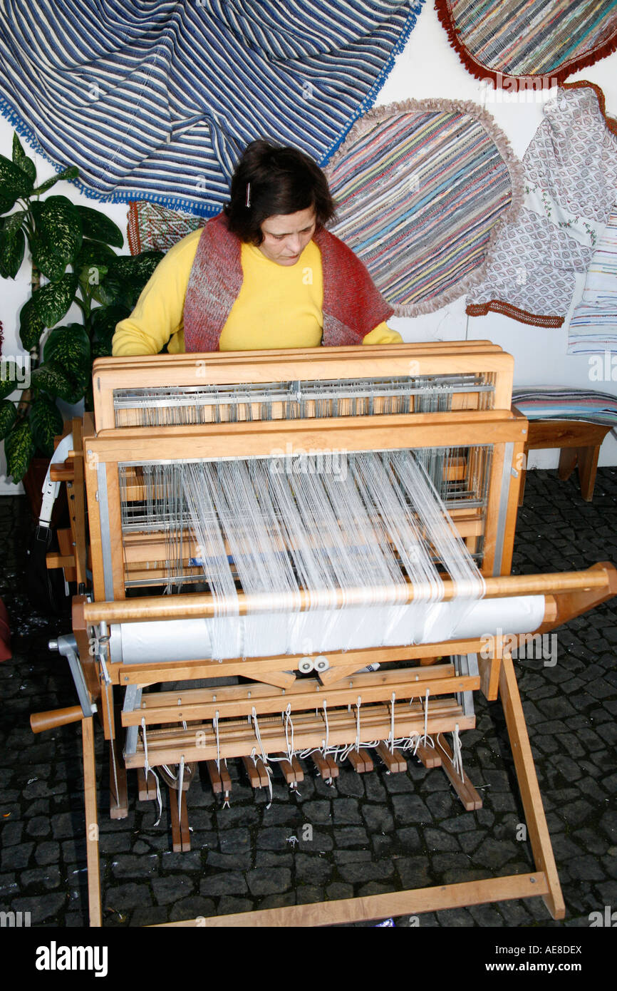 An azorean craftswoman weaving. Azores islands, Portugal Stock Photo ...