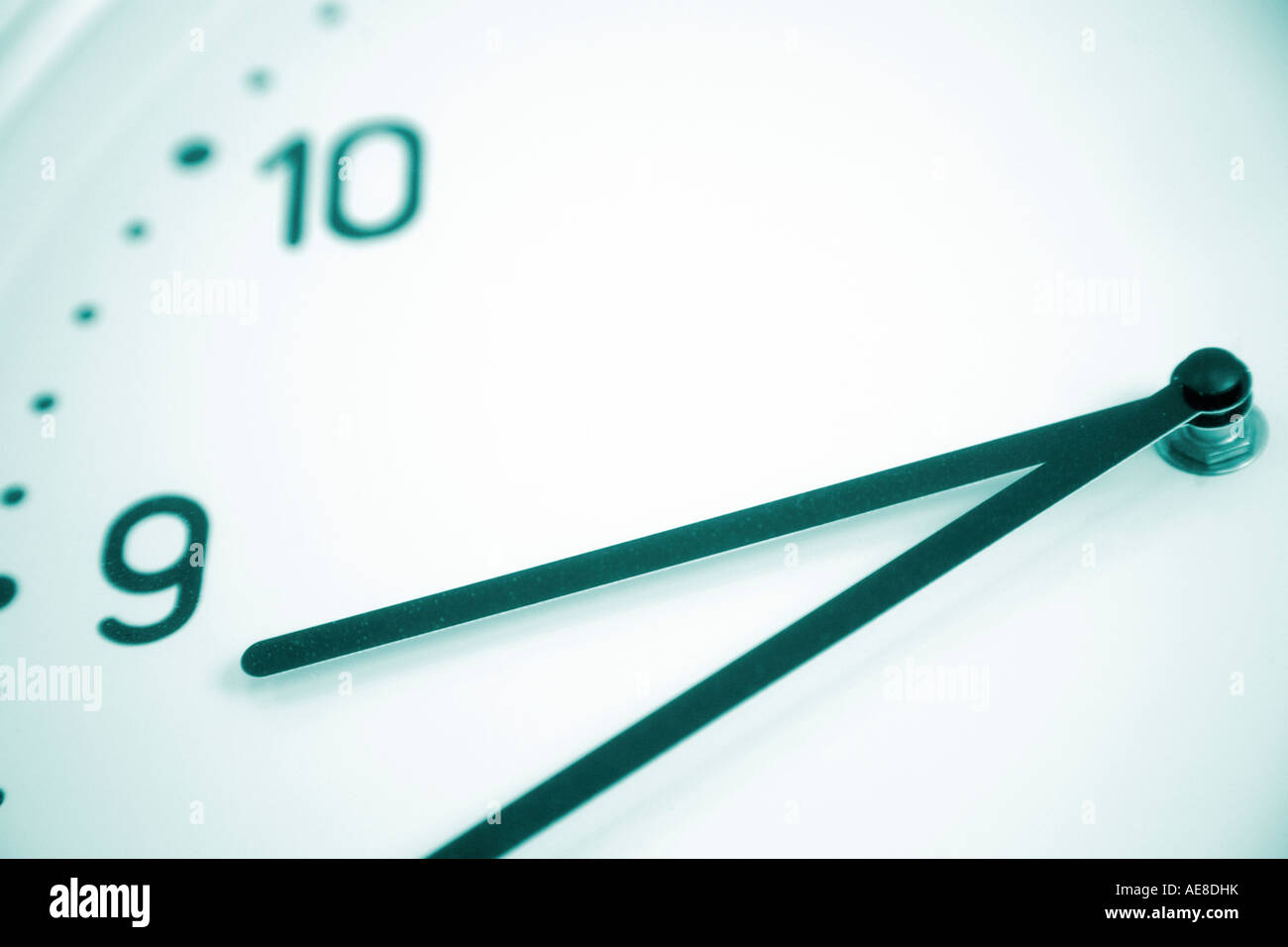 modern clock face showing hands and the numbers ten and nine Stock ...