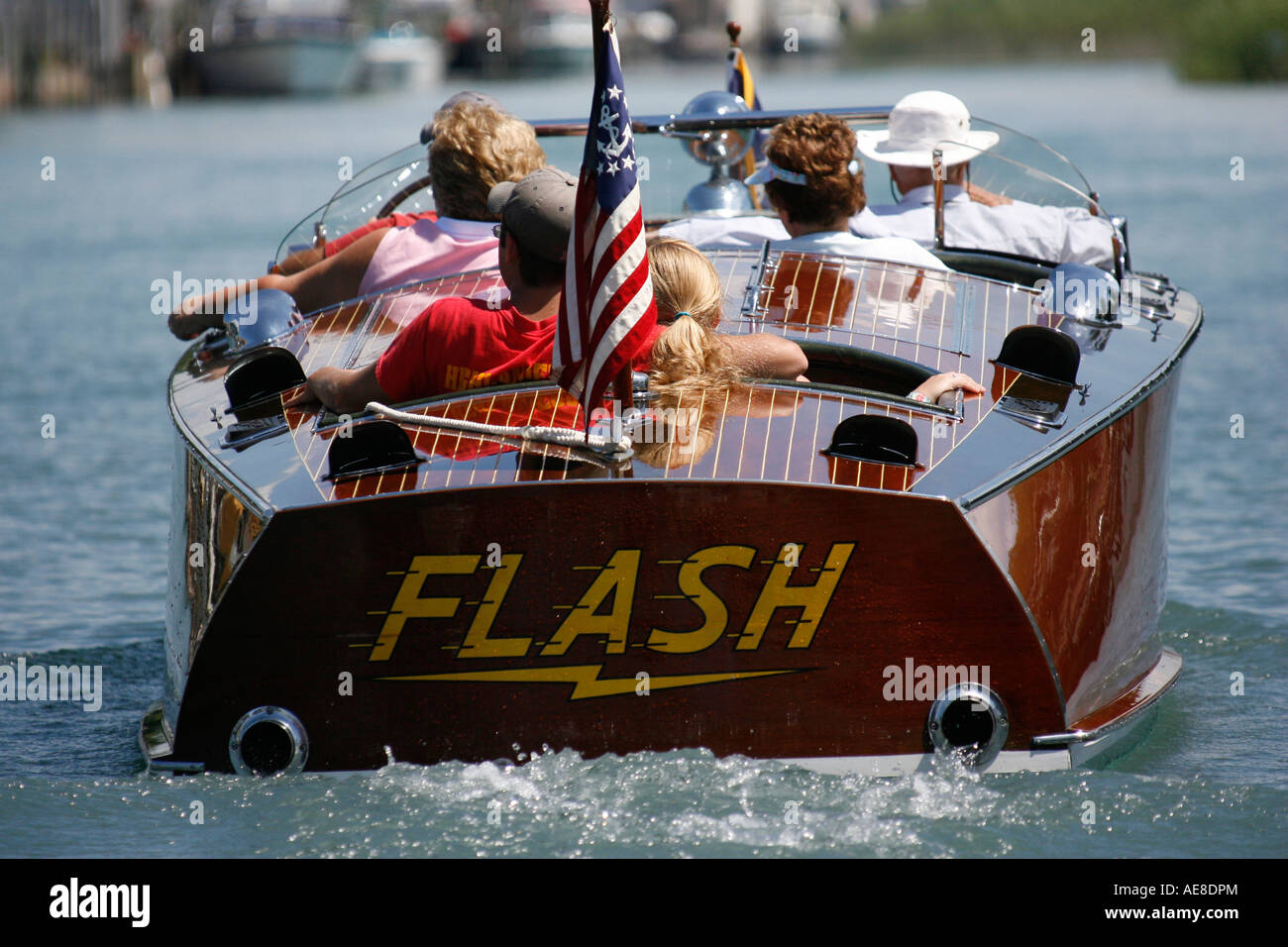 A boat full of people on a slow boat ride Stock Photo - Alamy
