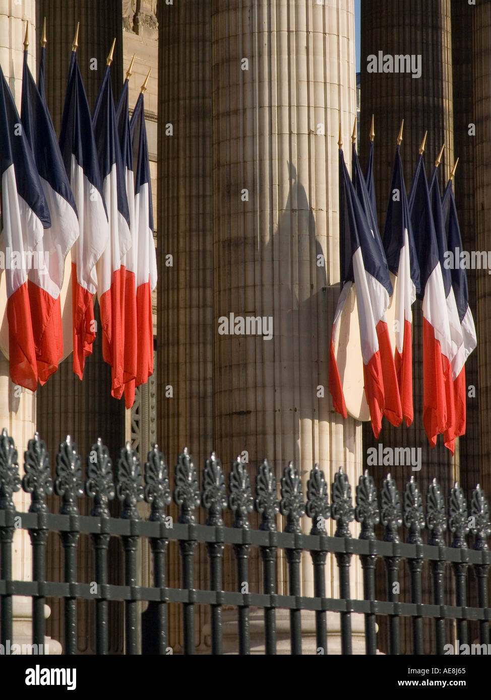 French Tri Color flags hang from the columns of the Pantheon Paris ...