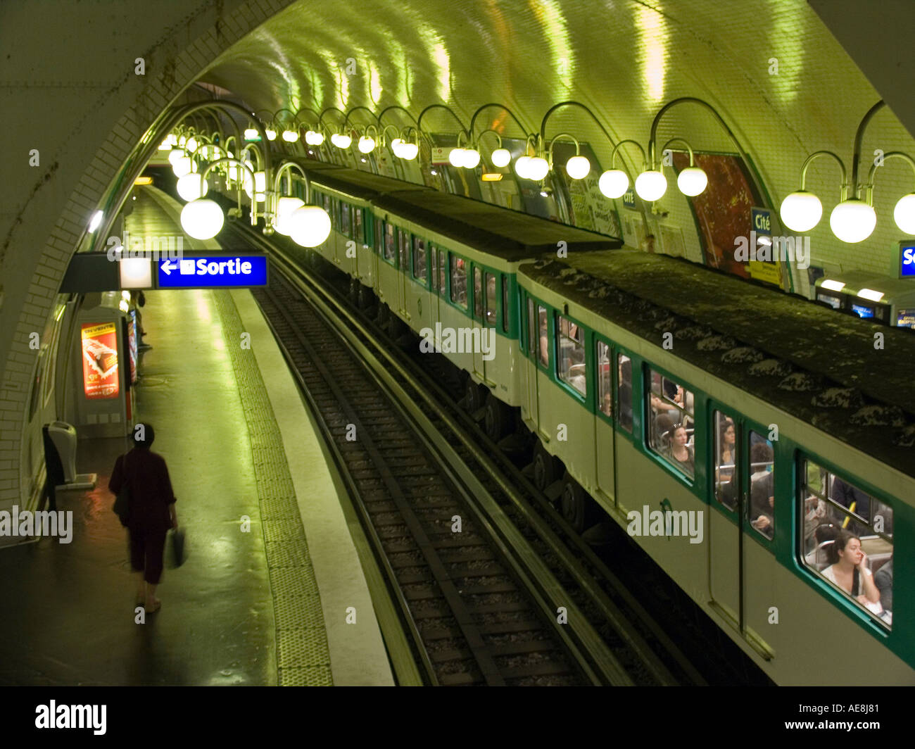 Metro train in Cite station Paris France Stock Photo - Alamy