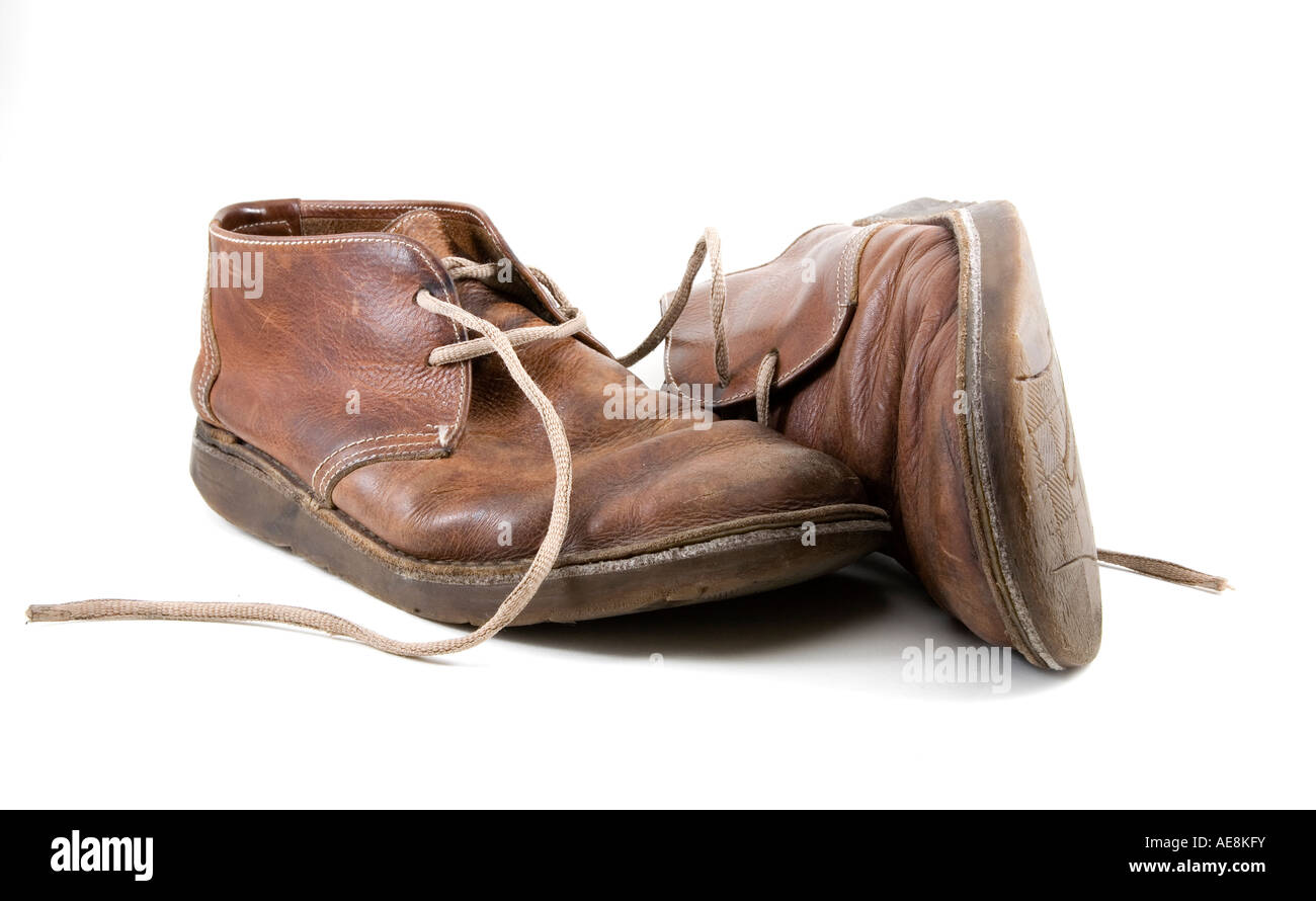 Old Brown shoes on white background Stock Photo - Alamy