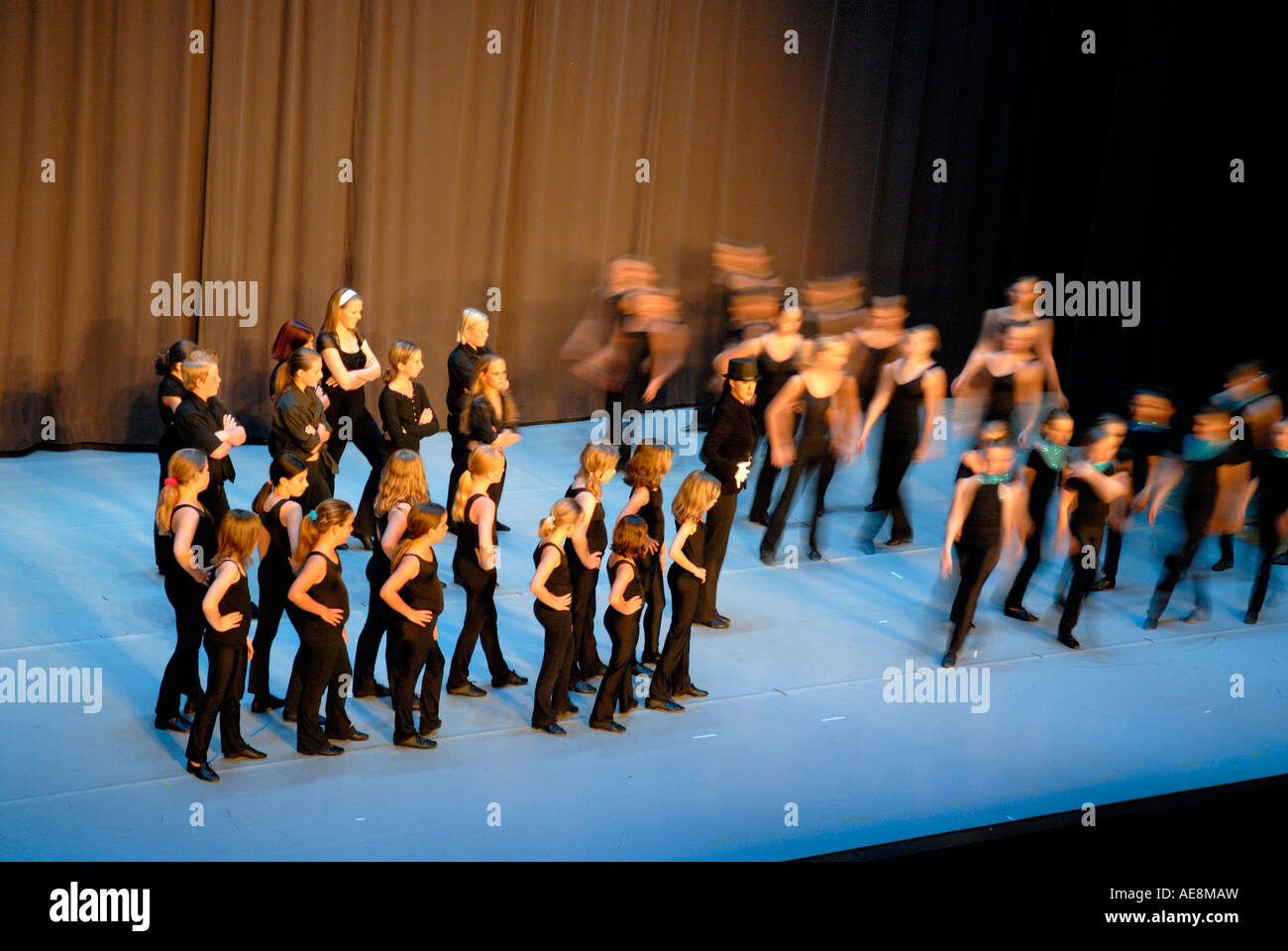 Female jazzdancing girls performing on stage Stock Photo - Alamy