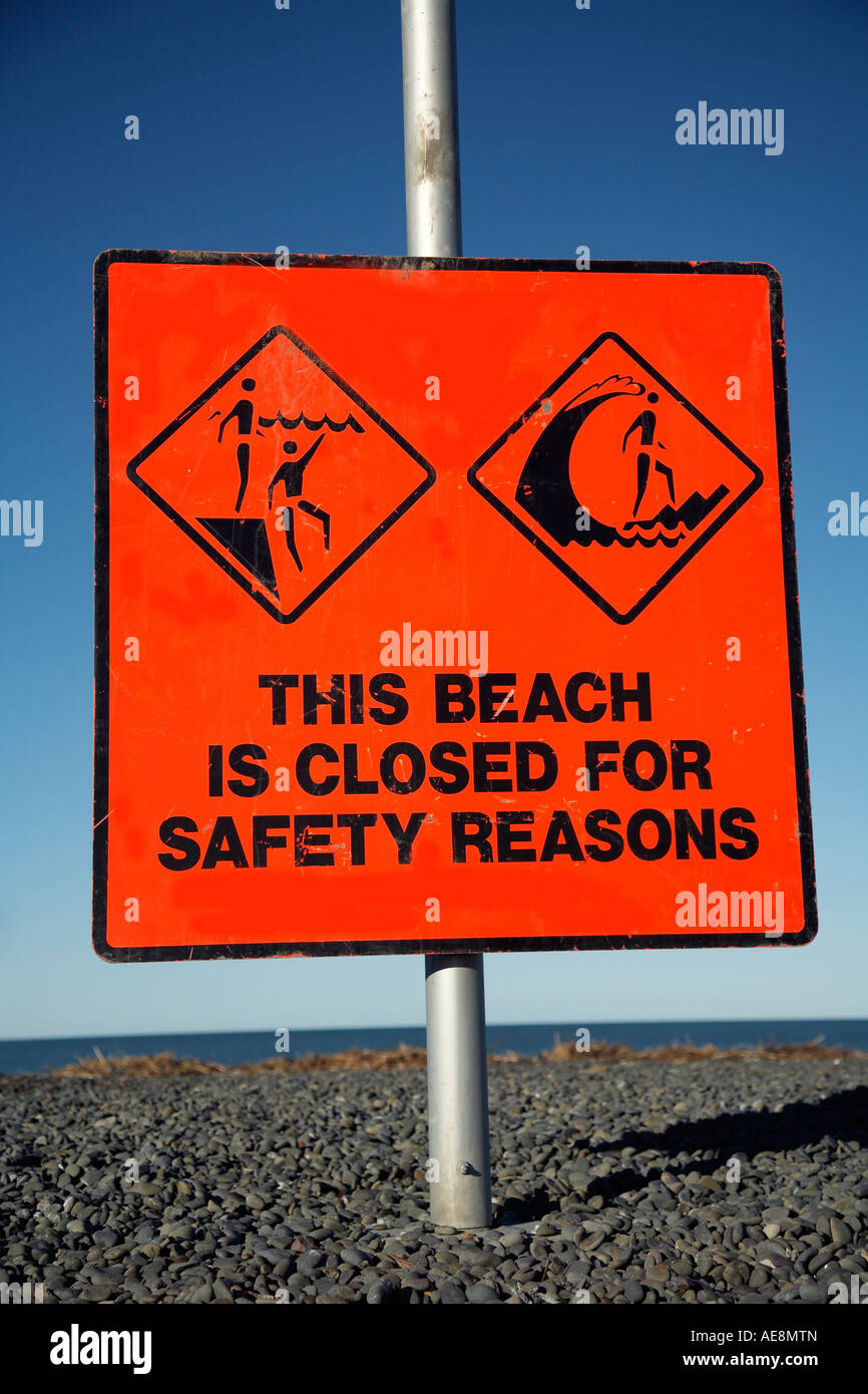 beach closed safety reasons sign Stock Photo - Alamy