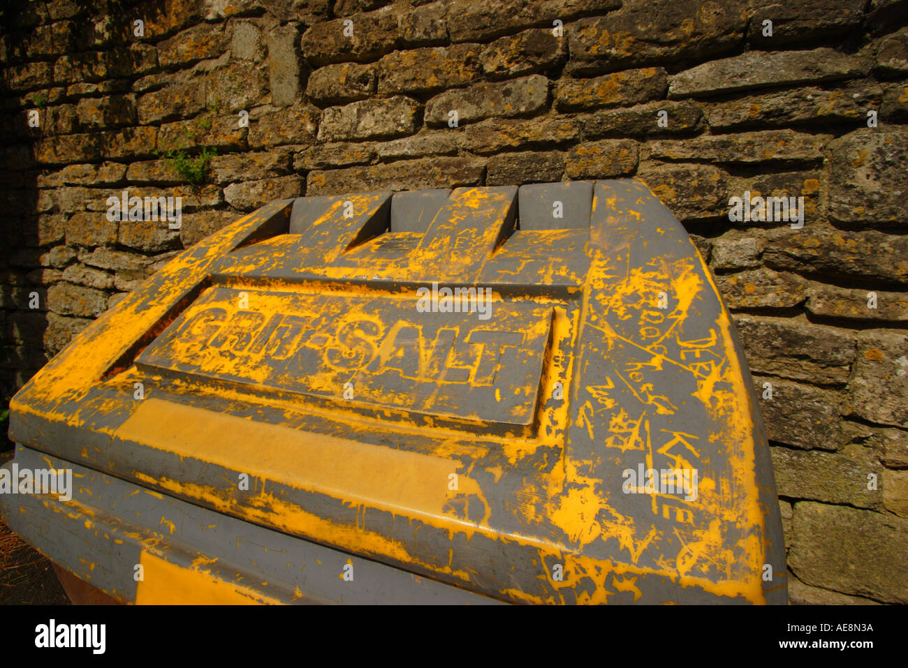 Yellow grit bin showing signs of needing painting grey primer showing ...