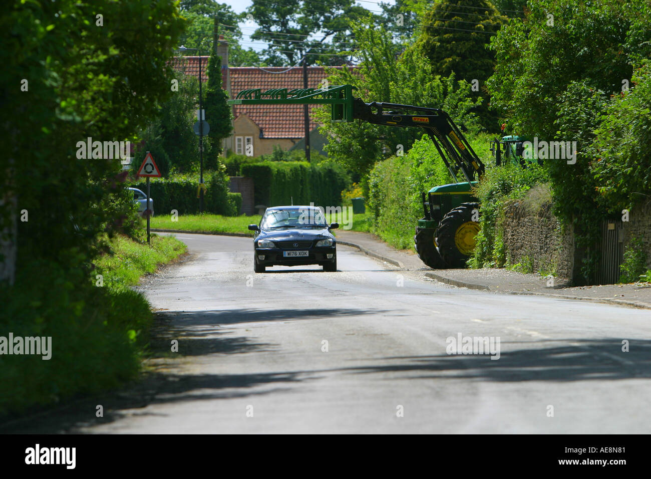 Tractor traffic country road uk hi-res stock photography and images - Alamy