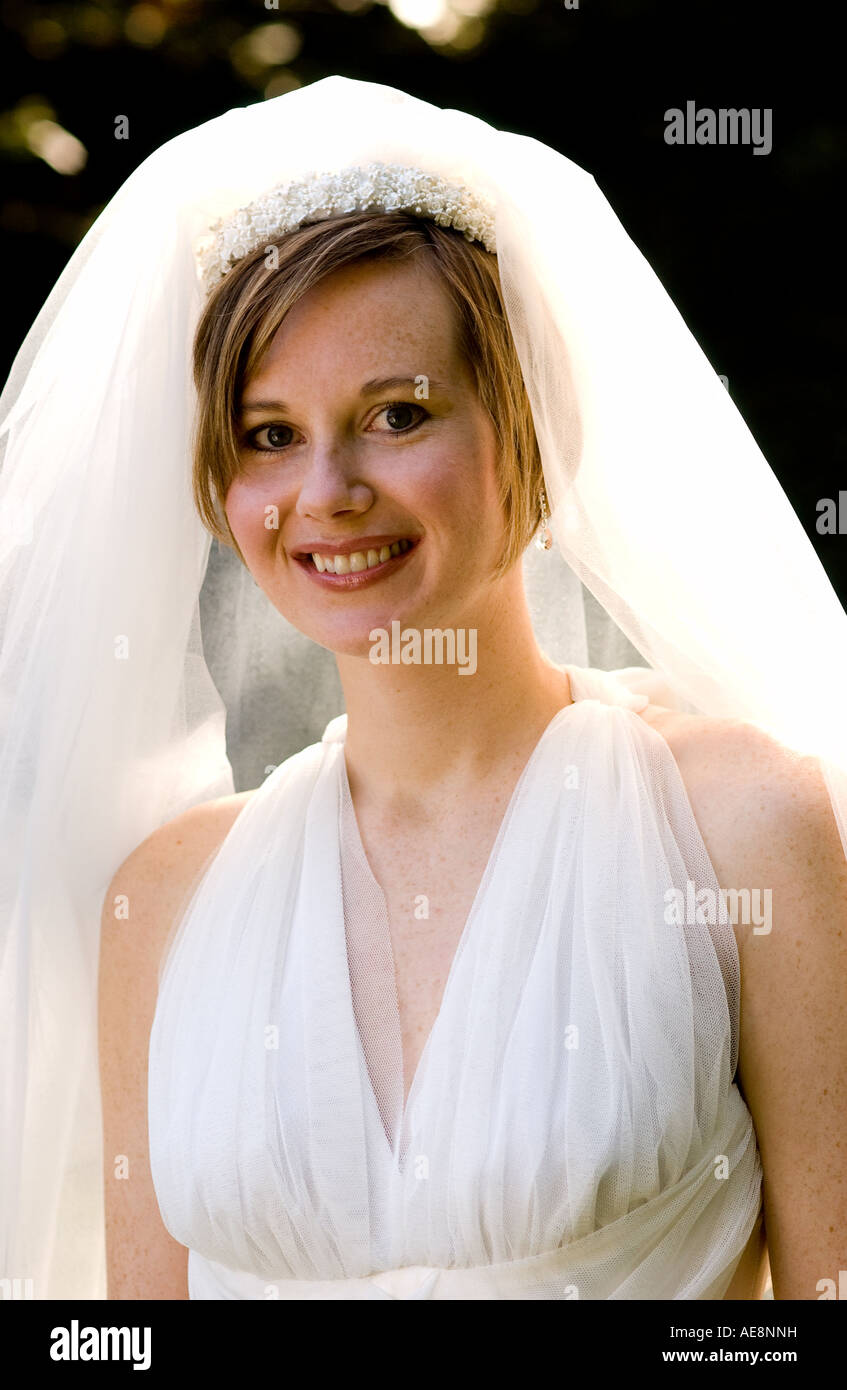 Portrait of a bride on her wedding day backlit by the sun Stock Photo ...
