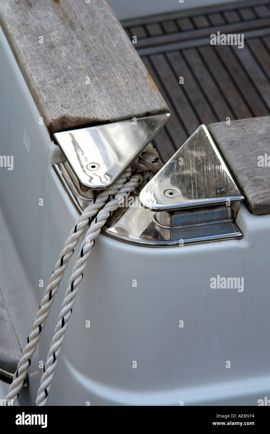Stainless steel mooring cleat on moored power boat Stock Photo - Alamy