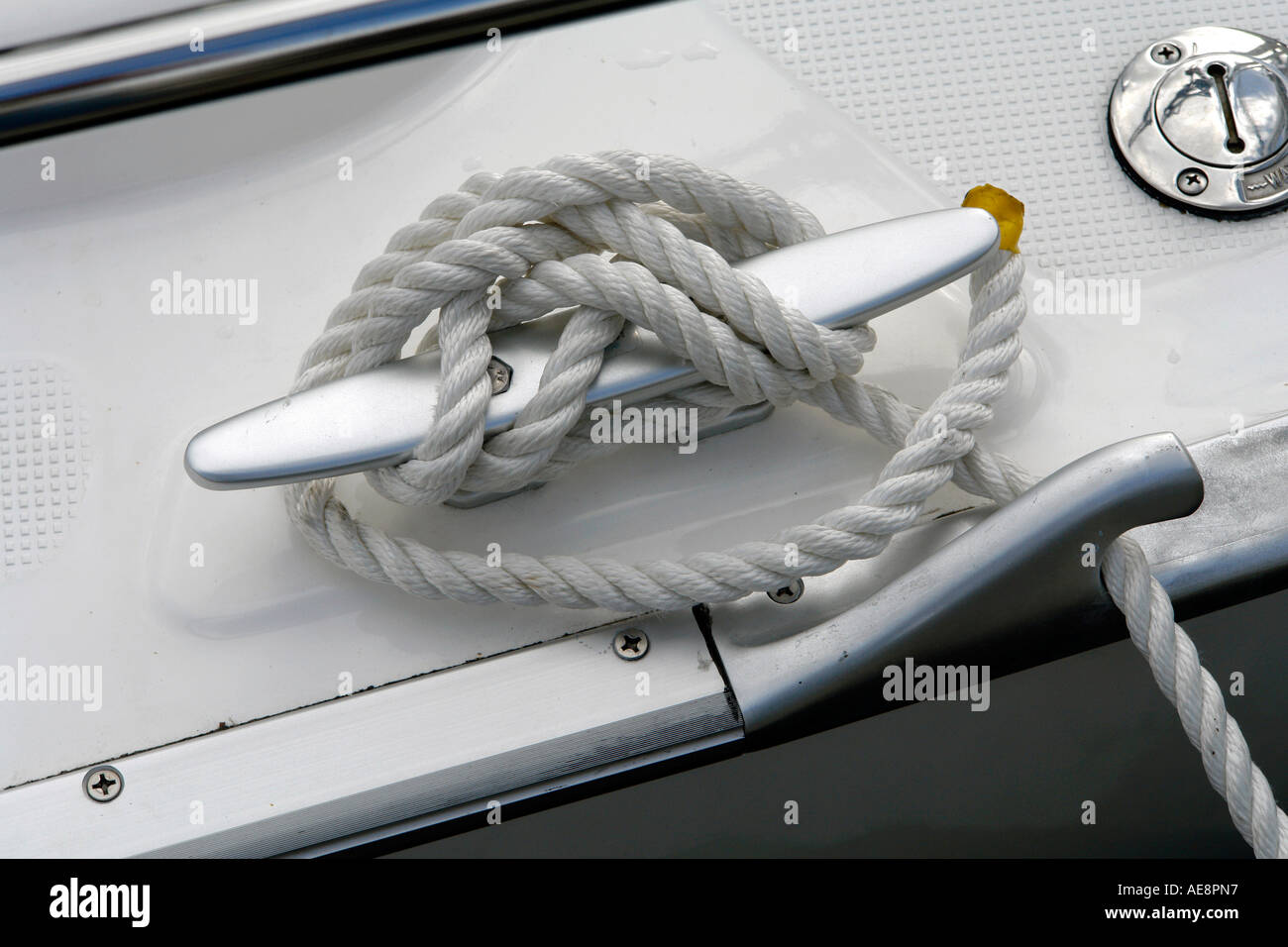 Mooring cleat and nylon line on pleasure craft Stock Photo - Alamy