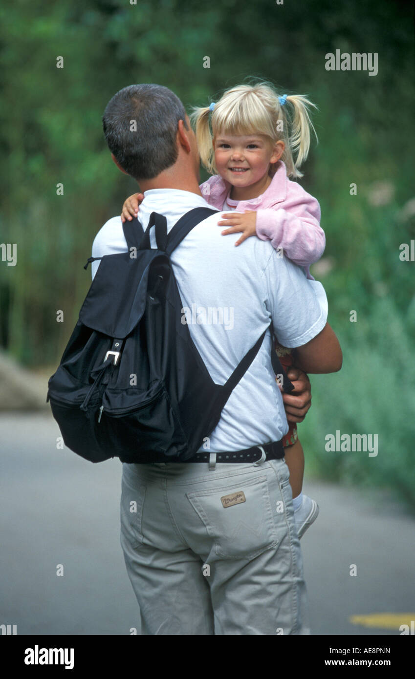 Father is carrying a child Stock Photo - Alamy
