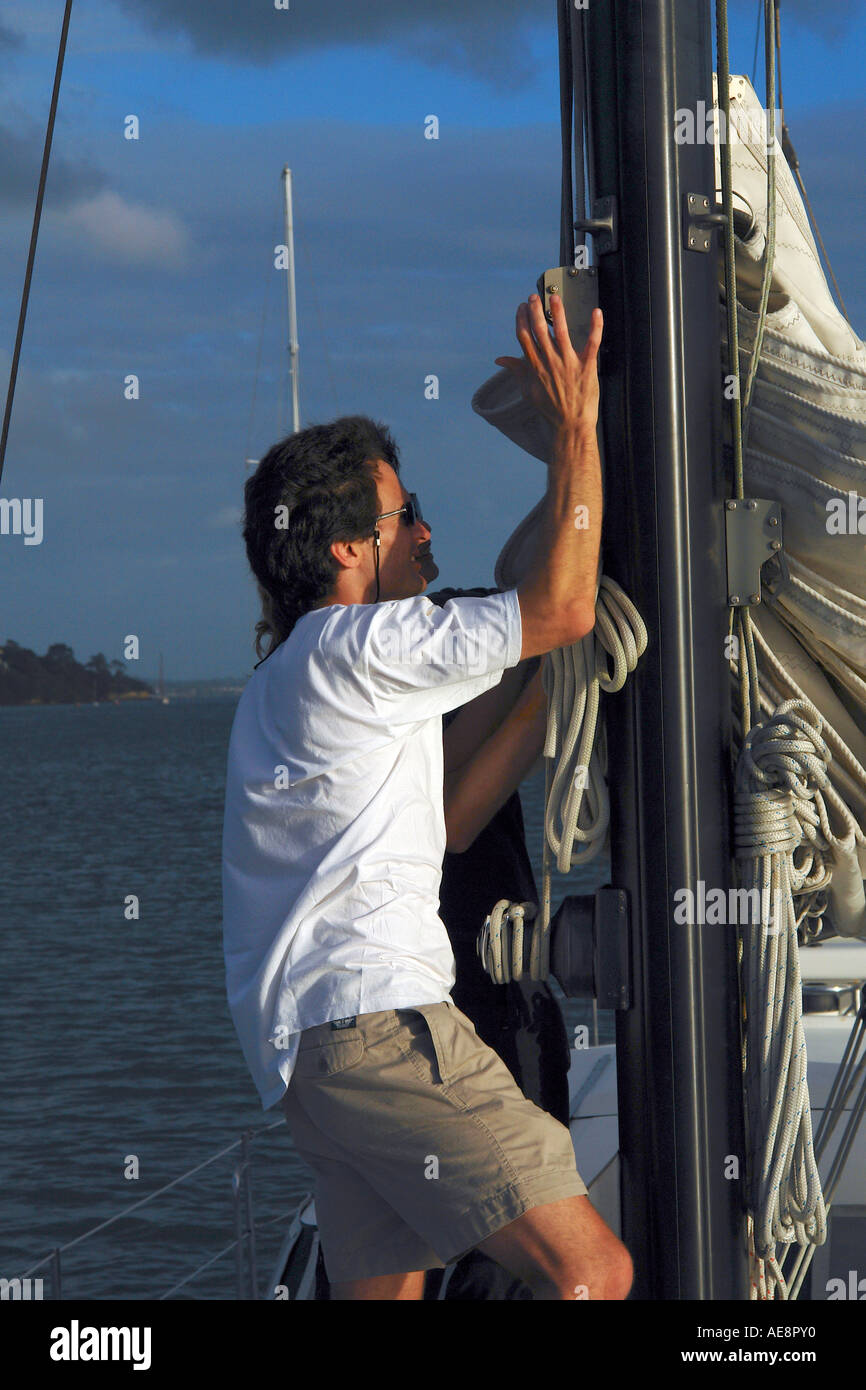 Hoisting sail at the mooring hi-res stock photography and images - Alamy