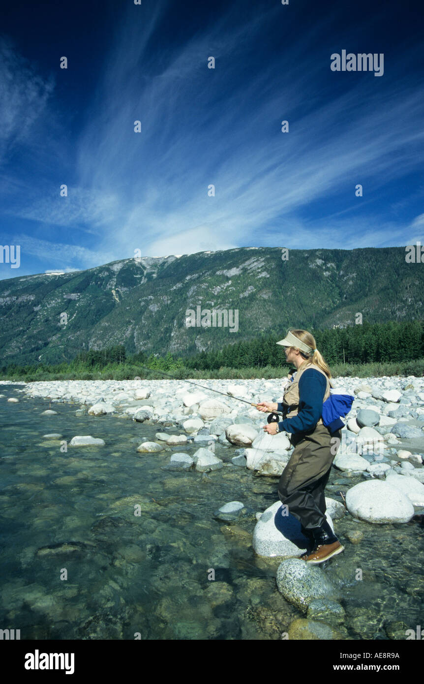 Lady flyfisher Jenora Jolly fishing for steelhead Dean river Central ...