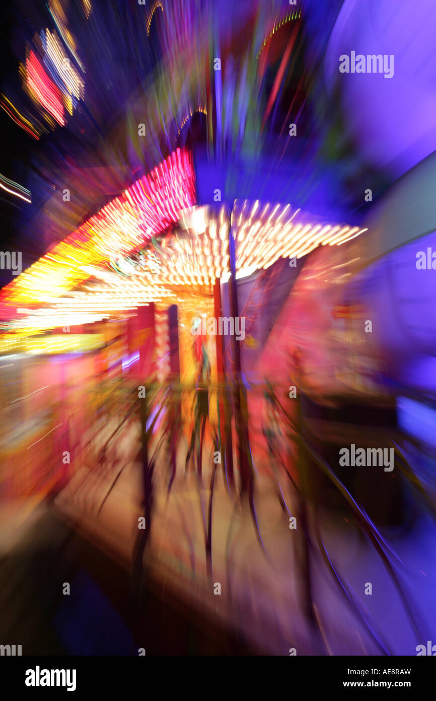 Blurred lights of fun fair ride Stock Photo - Alamy