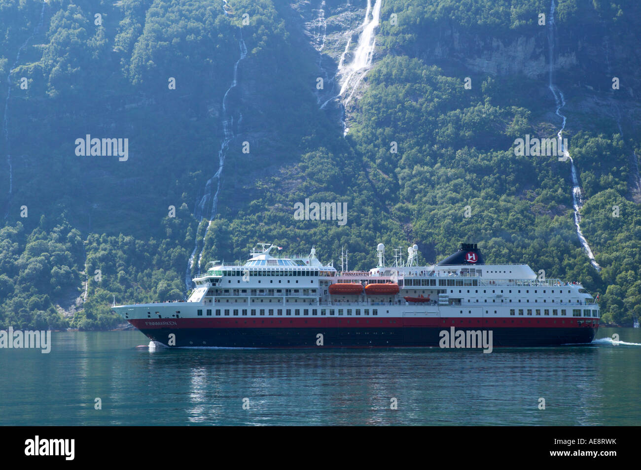 The Hurtigruten coastal ferry MS Finnmarken in Geirangerfjorden near ...