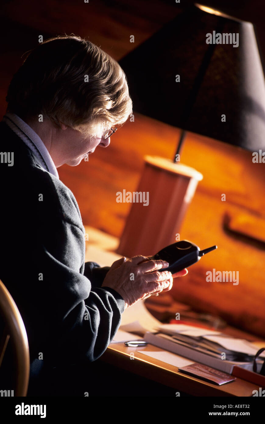 Senior citizen using portable phone BC canada Stock Photo - Alamy