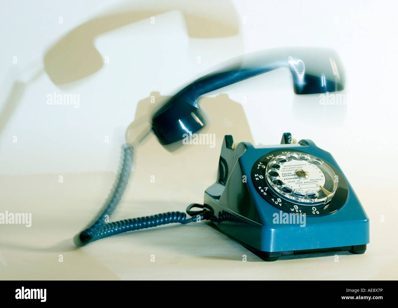 an old retro phone with the receiver floating in mid air magic Stock ...