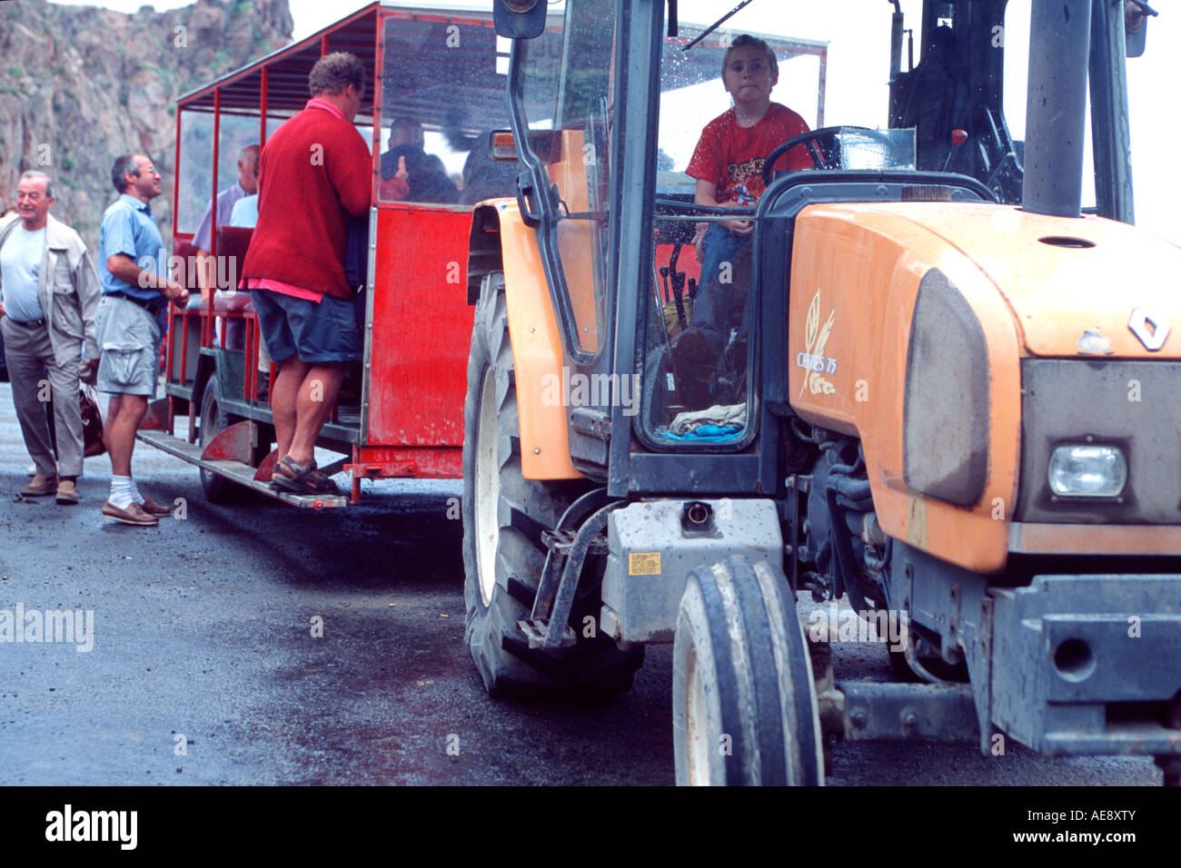 Local tractor pulled bus from harbor Island of Sark Stock Photo - Alamy