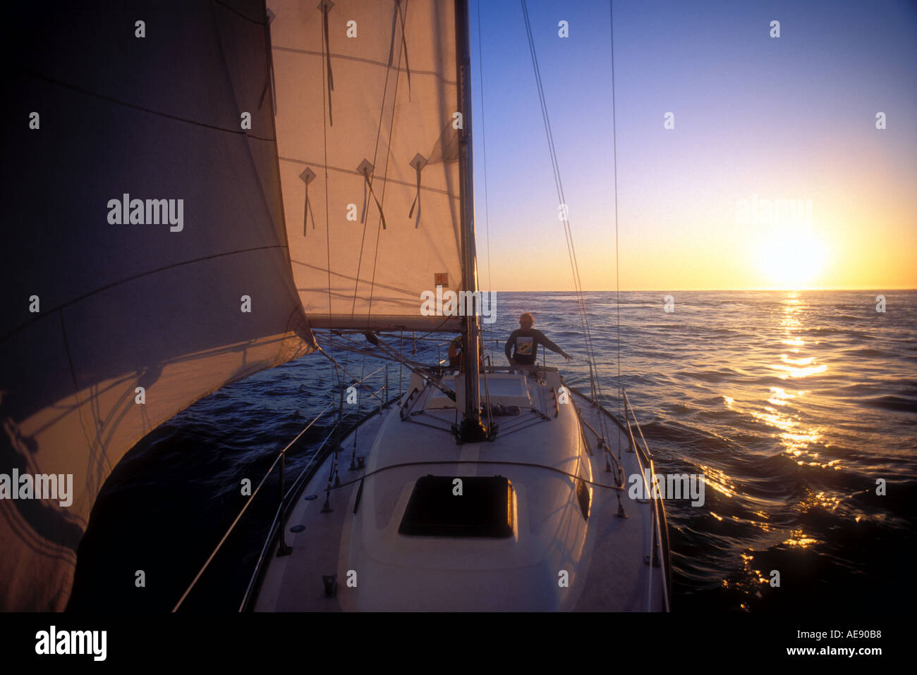 Sailing boat at sunset hi-res stock photography and images - Alamy