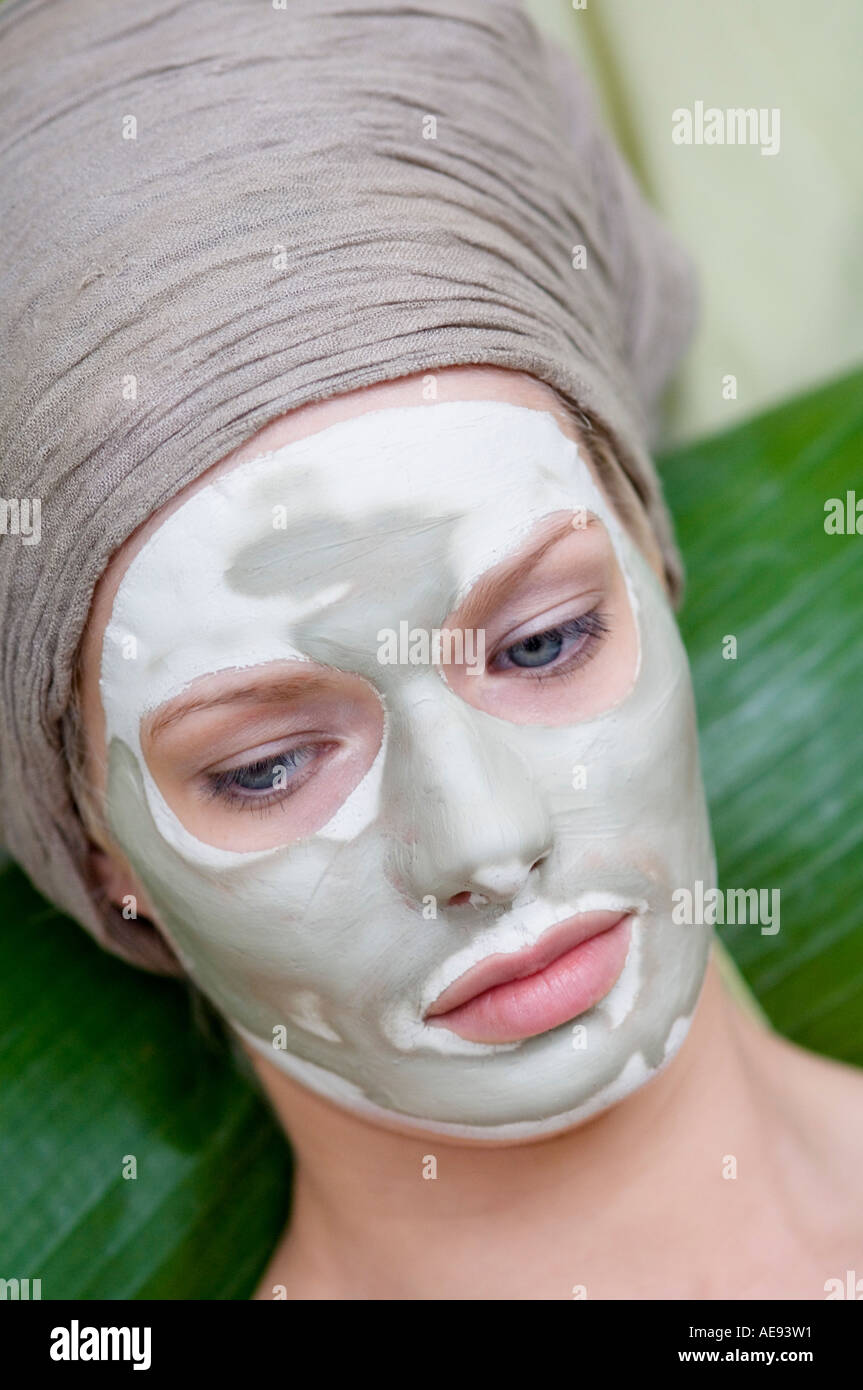 Portrait of a young woman with beauty mask on her face Stock Photo - Alamy