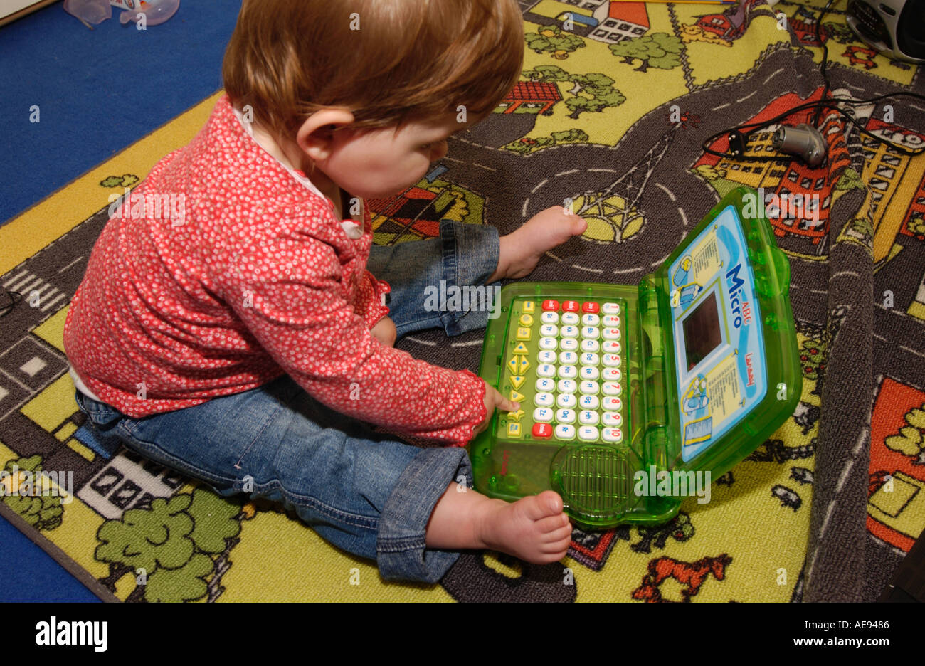 baby playng with a computer Stock Photo - Alamy
