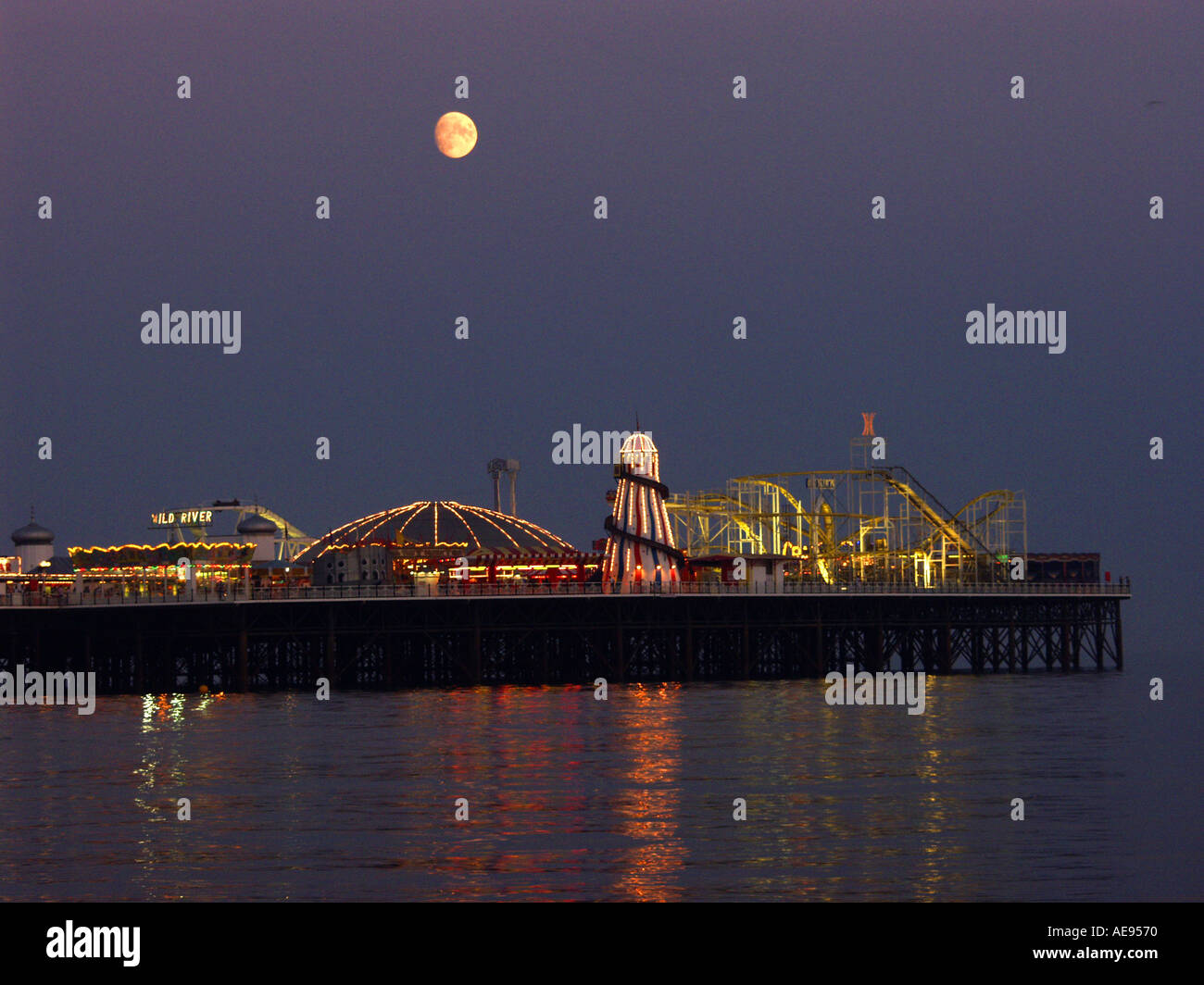 Brighton pier dusk moon hi-res stock photography and images - Alamy