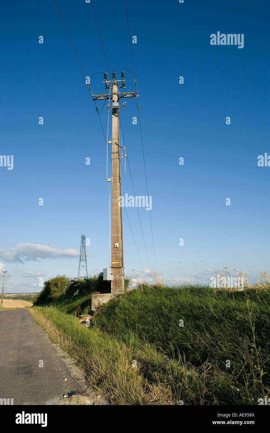 pylons in the french countryside, set against a beautiful blue sky ...