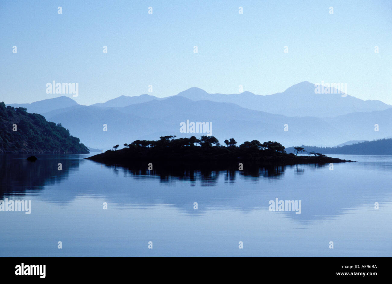 Turkey calm bay at dawn island with background mountains and ...