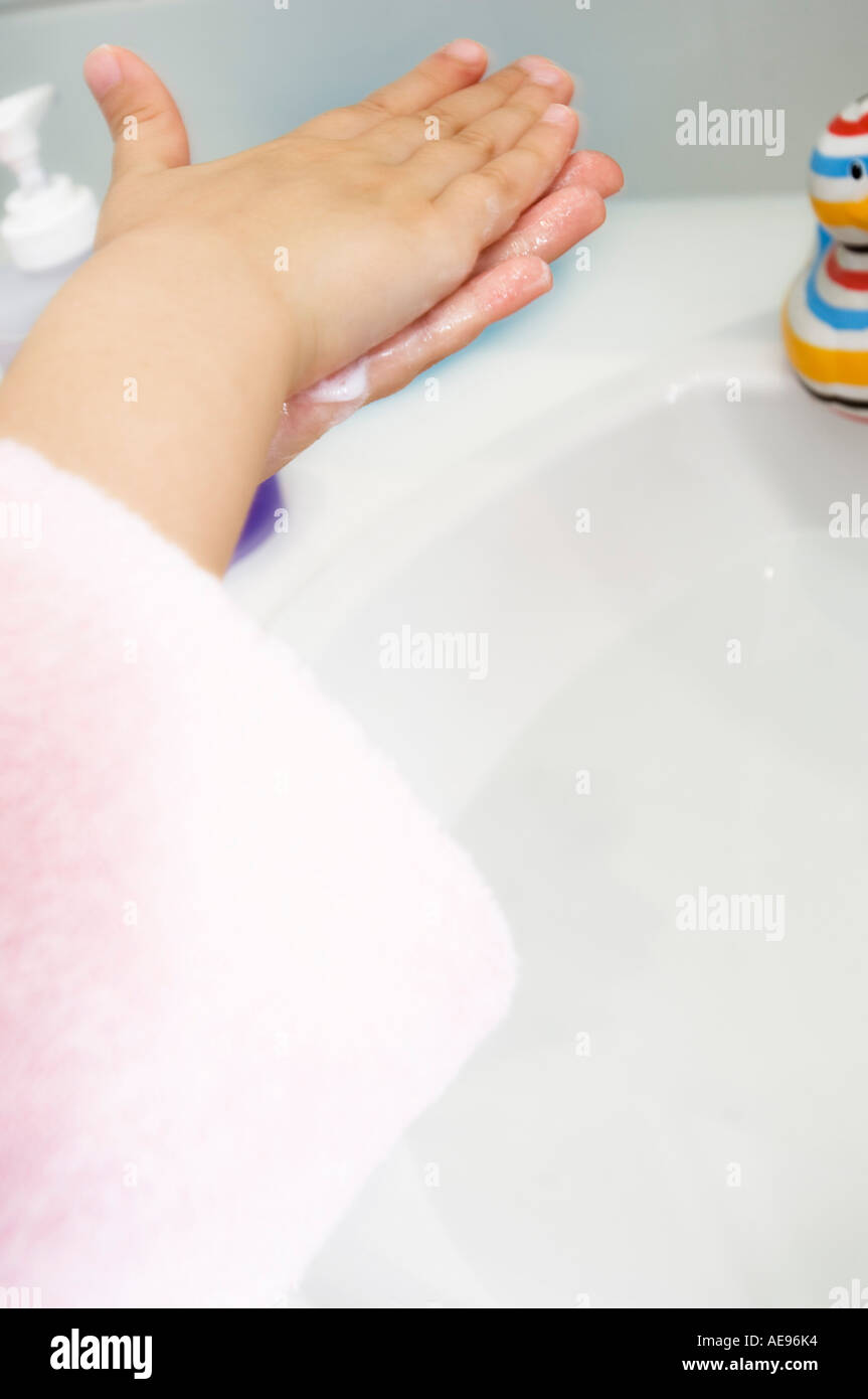 Little girl washing her hands, close-up Stock Photo - Alamy