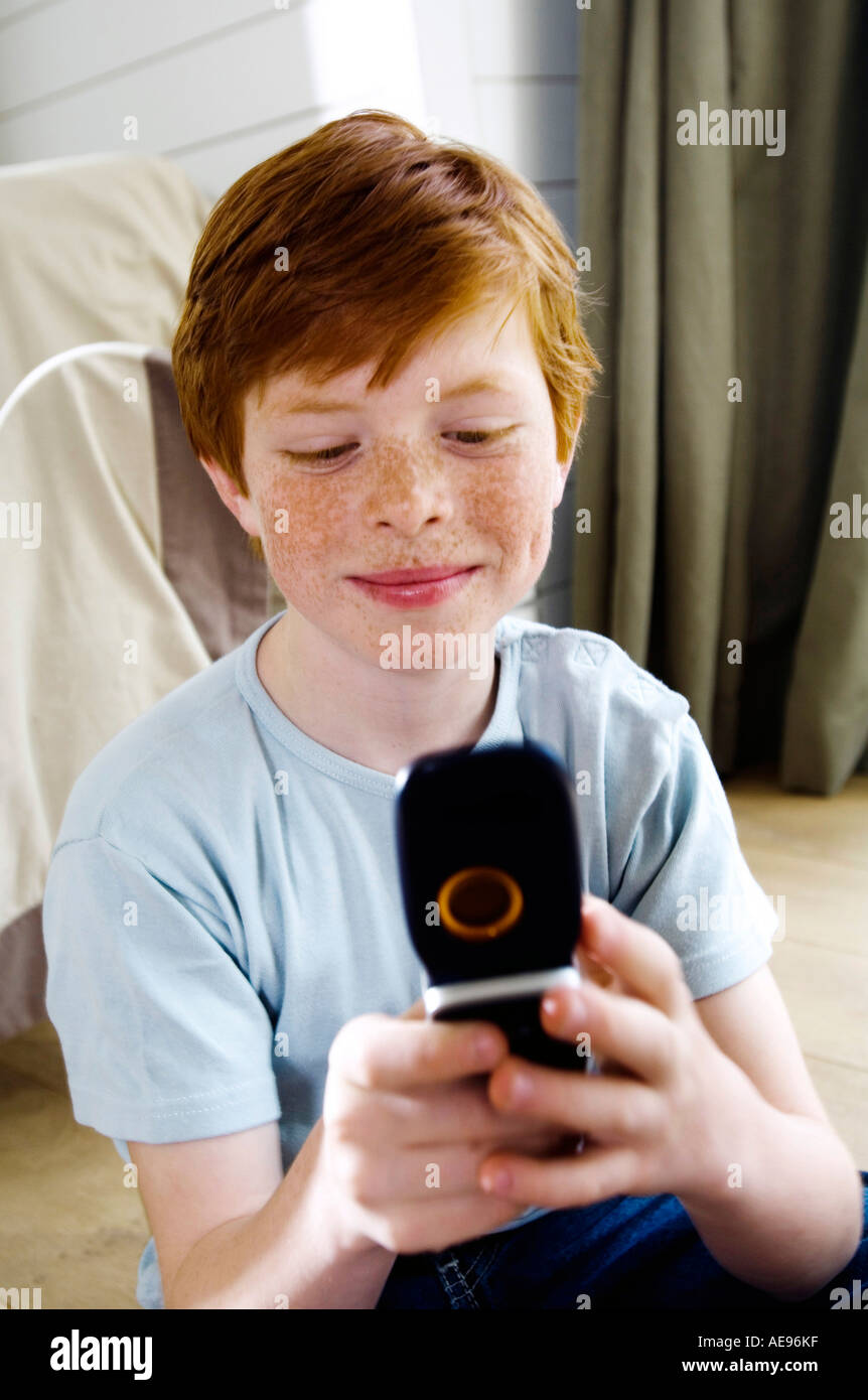 Little boy with mobile phone Stock Photo - Alamy