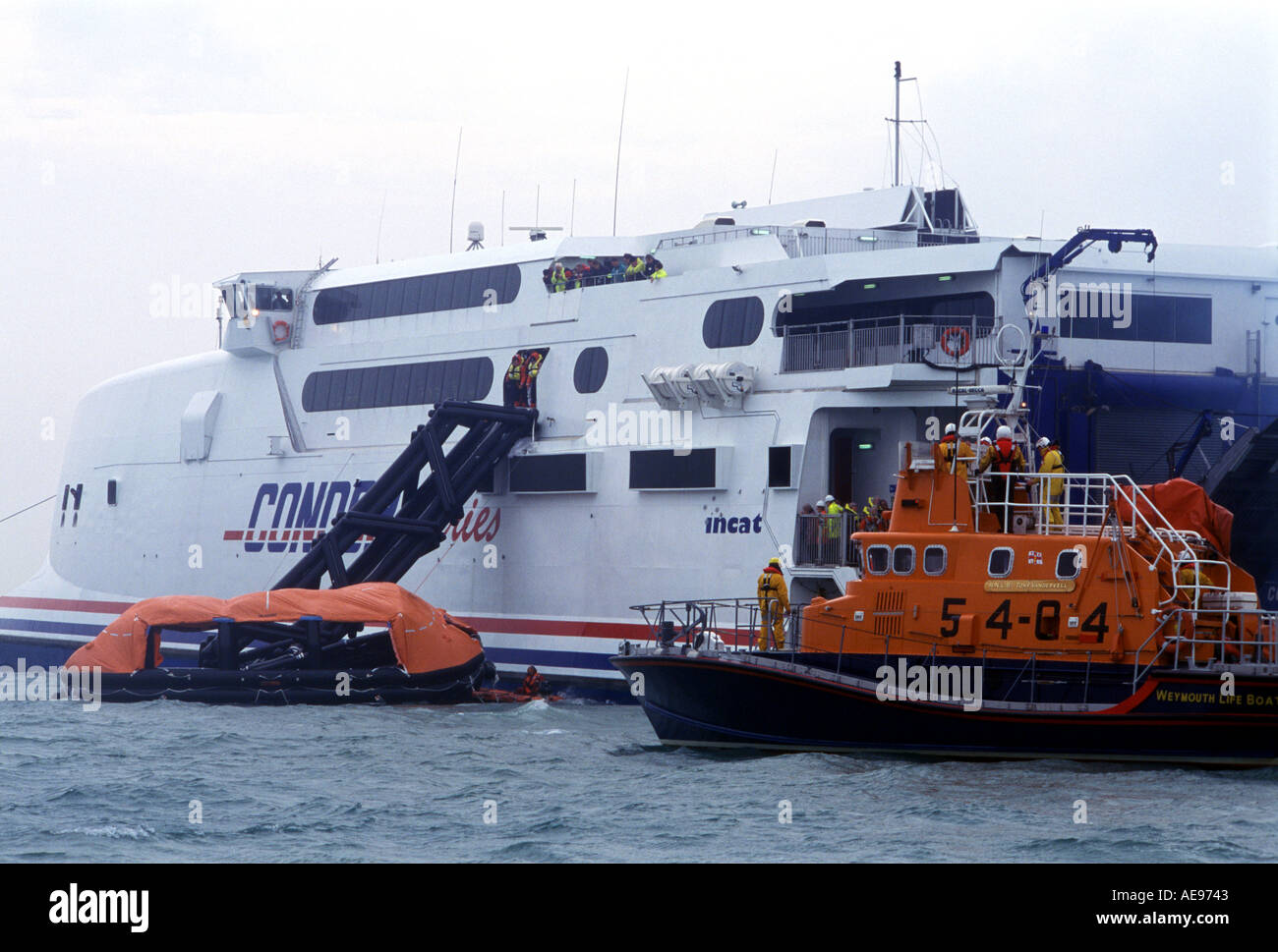 A rescue exercise by the coastguard on a Condor passenger ship Stock ...