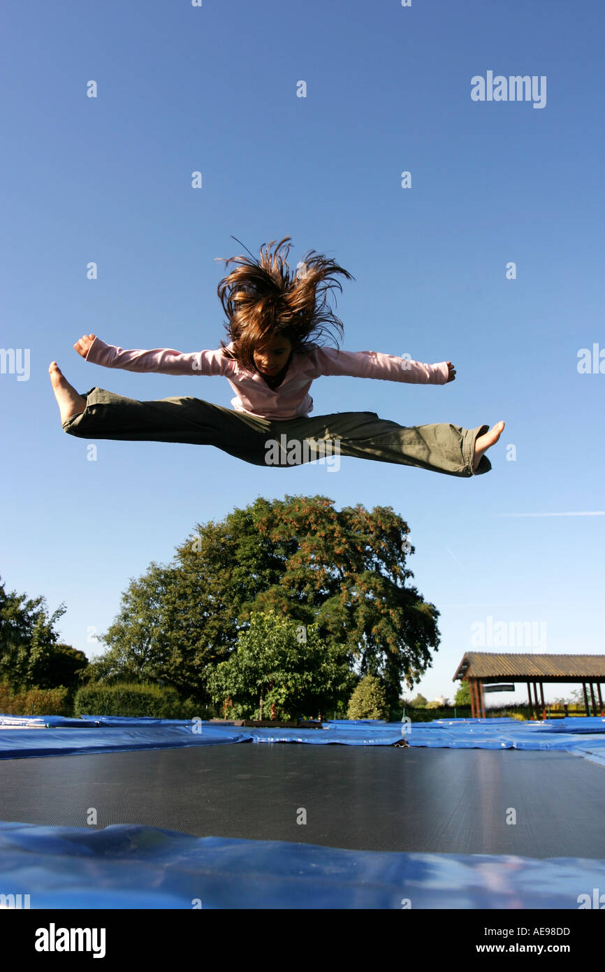 Jumping happy family teenagers hi-res stock photography and images - Alamy