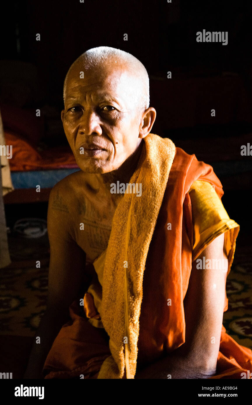 Stock photo of an elder monk at Bakong Monastery outside Bakong temple ...